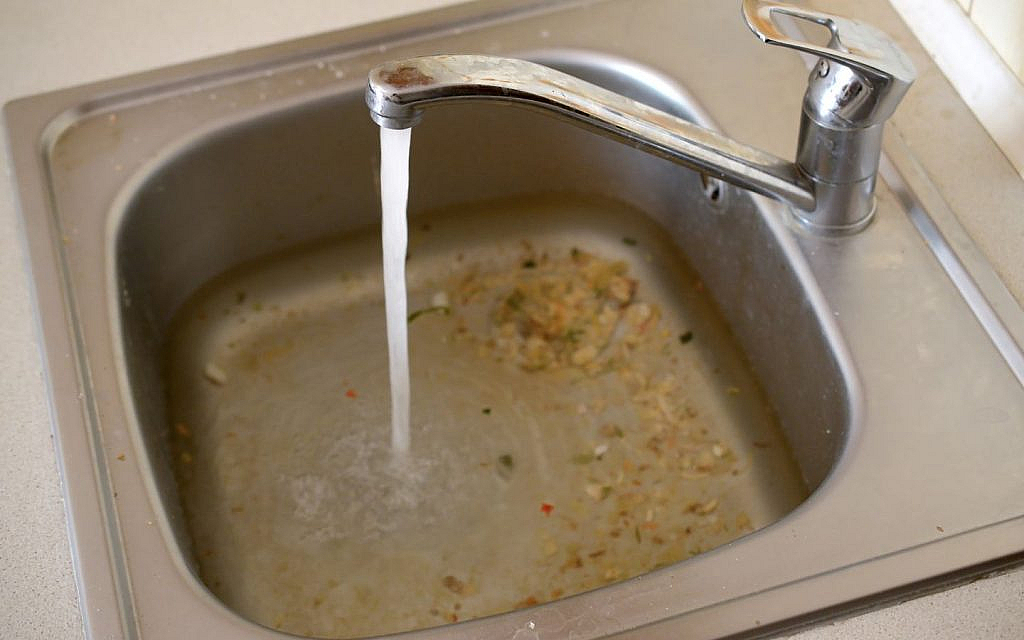 Clear a Clogged Drain in an Apartment: Causes & Steps | dubizzle